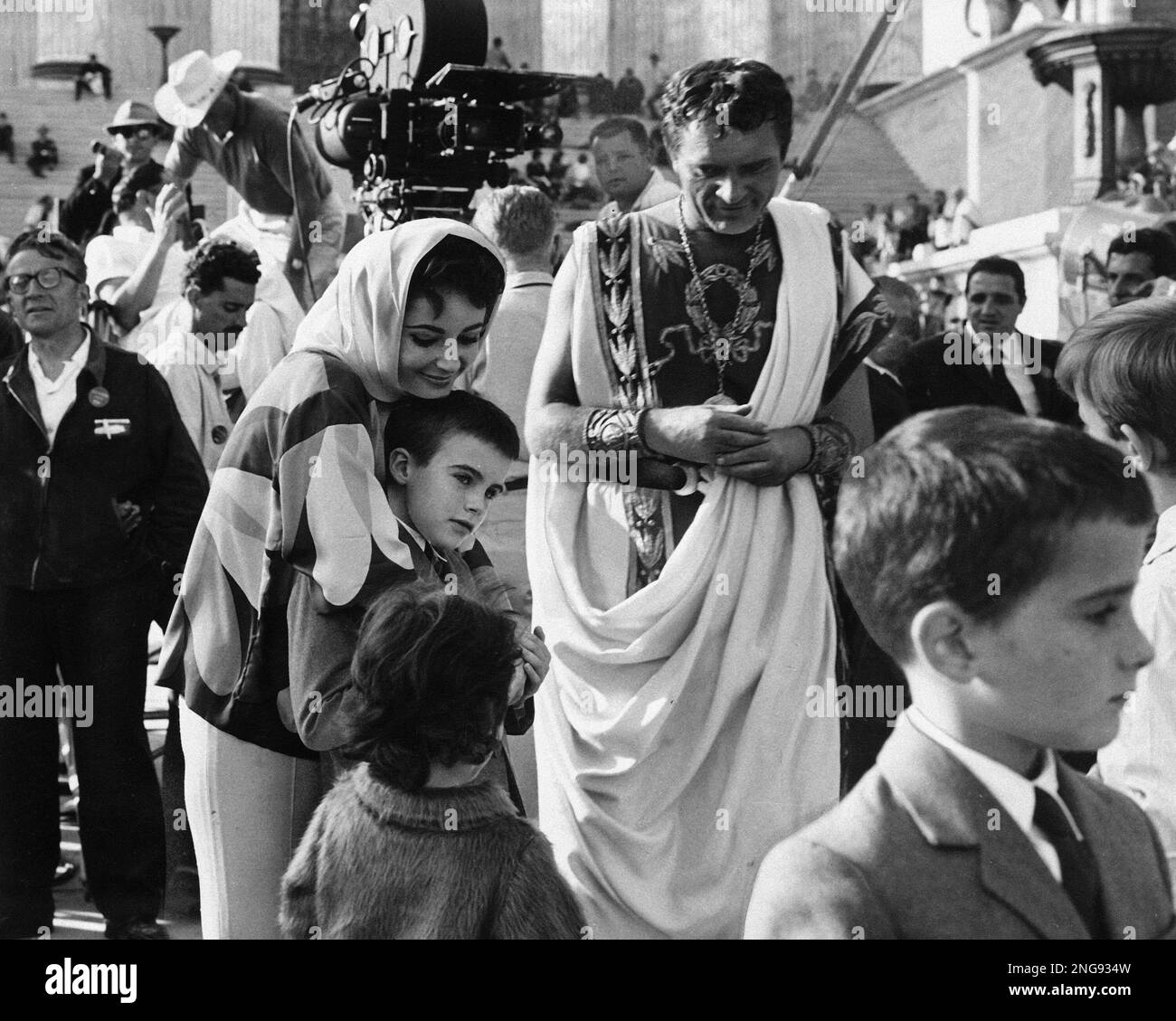 Actress Elizabeth Taylor hugs her son Michael Wilding Jr. at the Rome ...
