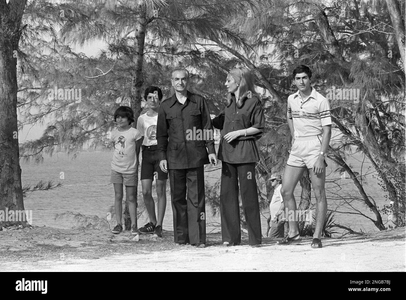 The deposed Shah of Iran is shown with his children and wife ...