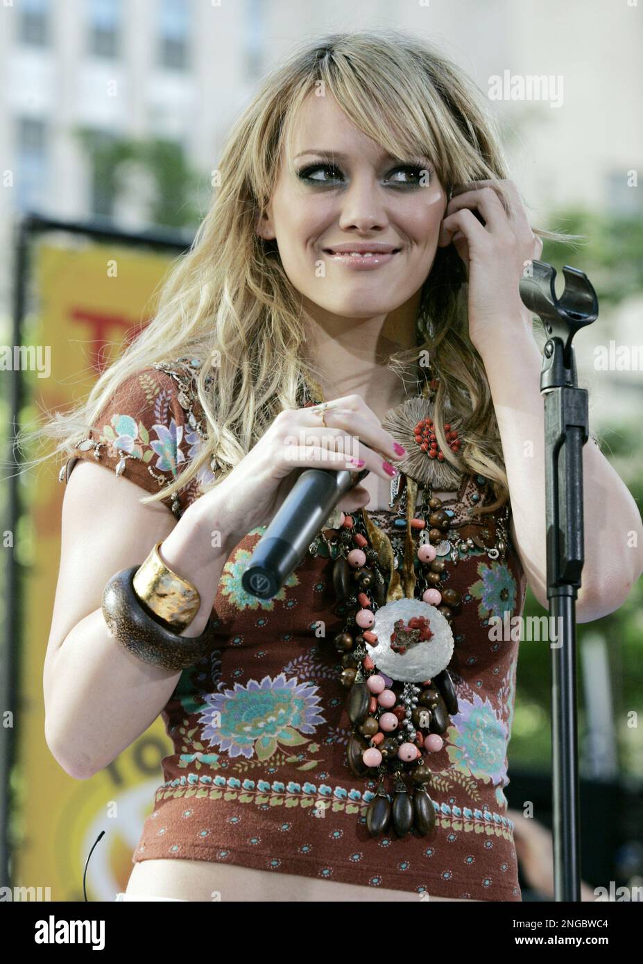 Singer and actress Hilary Duff listens to applause during her ...