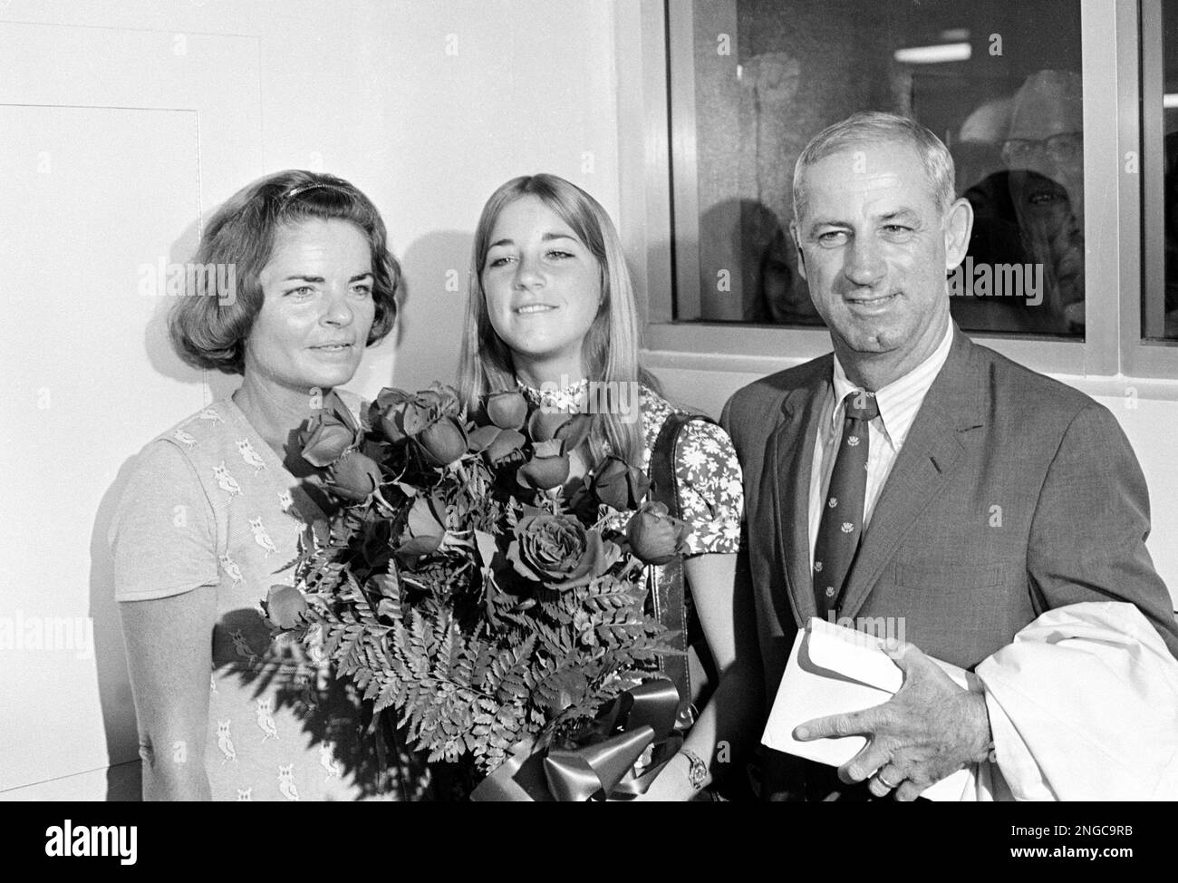 Chris Evert, 16-year-old tennis star, center, with her mother and ...