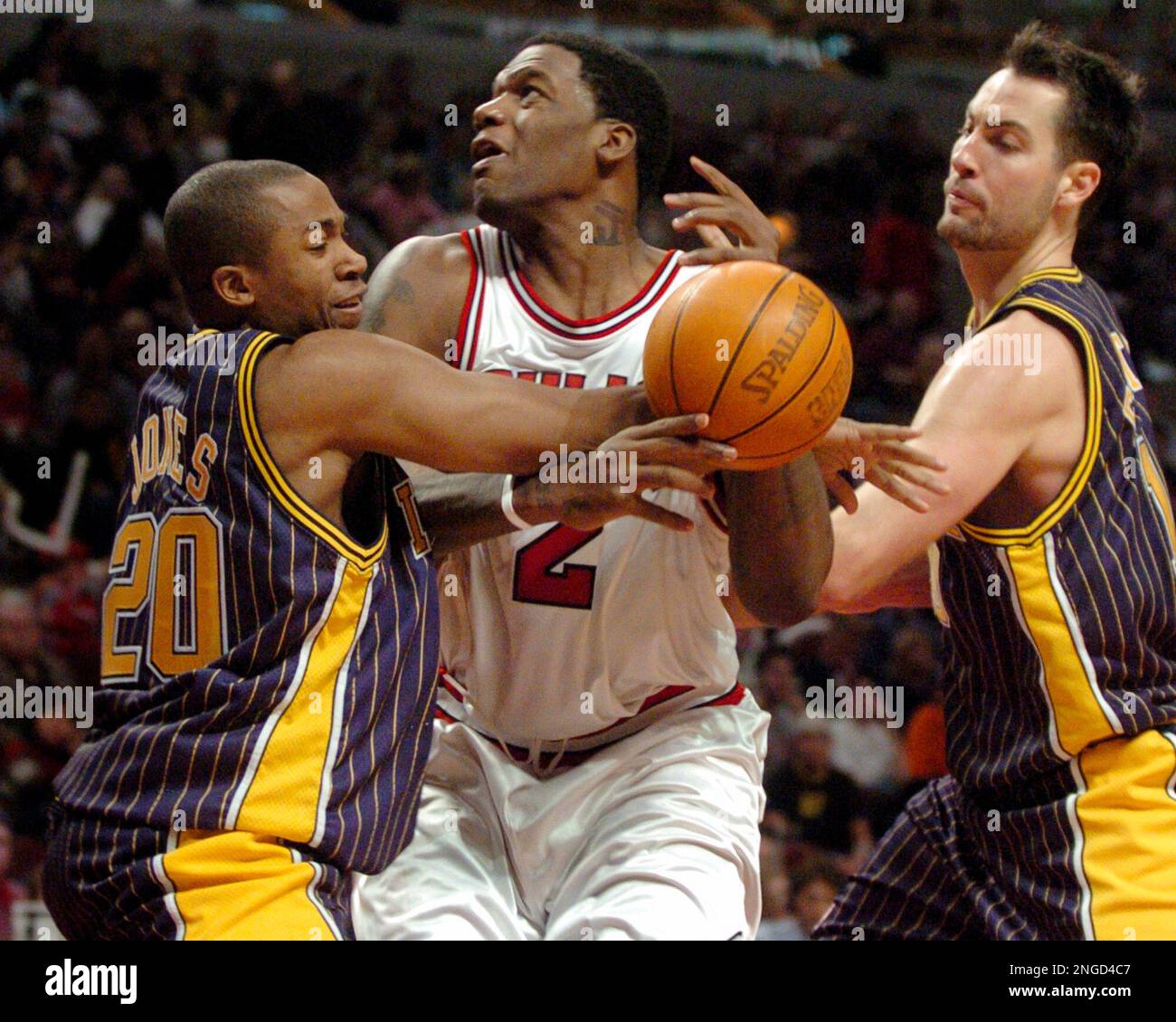 Chicago Bulls' Eddy Curry, center, is fouled by Indiana Pacers' Fred ...