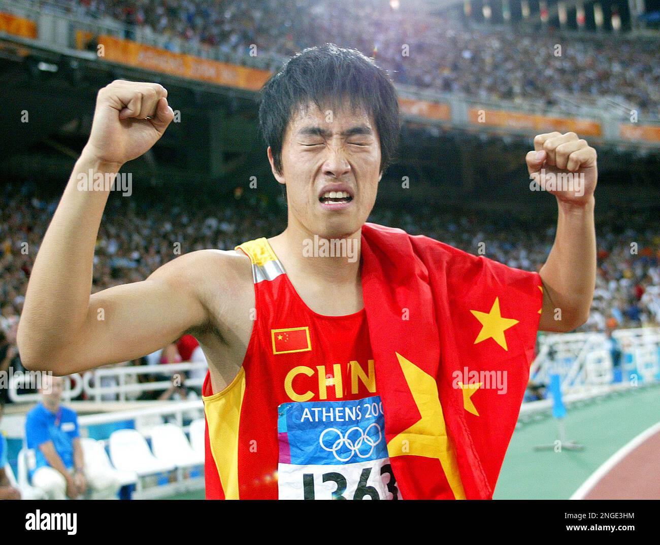 China's Liu Xiang reacts after winning the gold medal in the 110-meter ...