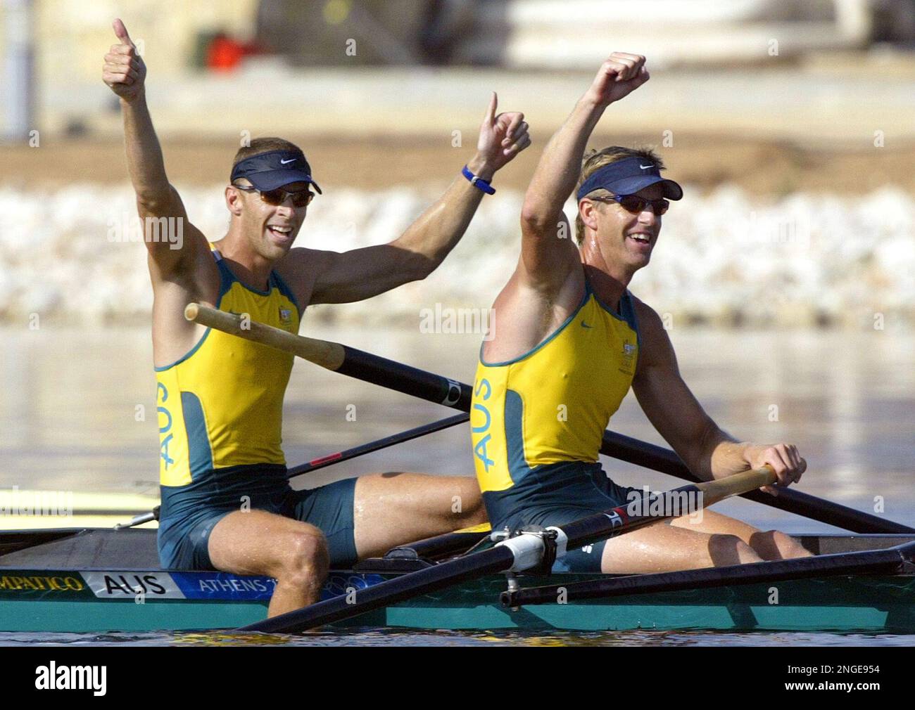 Australia's Ginn Drew, left, and James Tomkins react after they won the ...