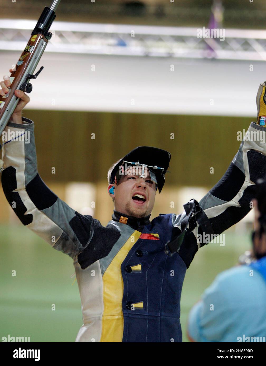 USA's Matthew Emmons realizes he just won the men's 50m rifle prone ...