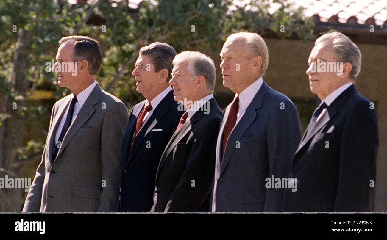 Four former U.S. presidents and President George Bush pose together at ...