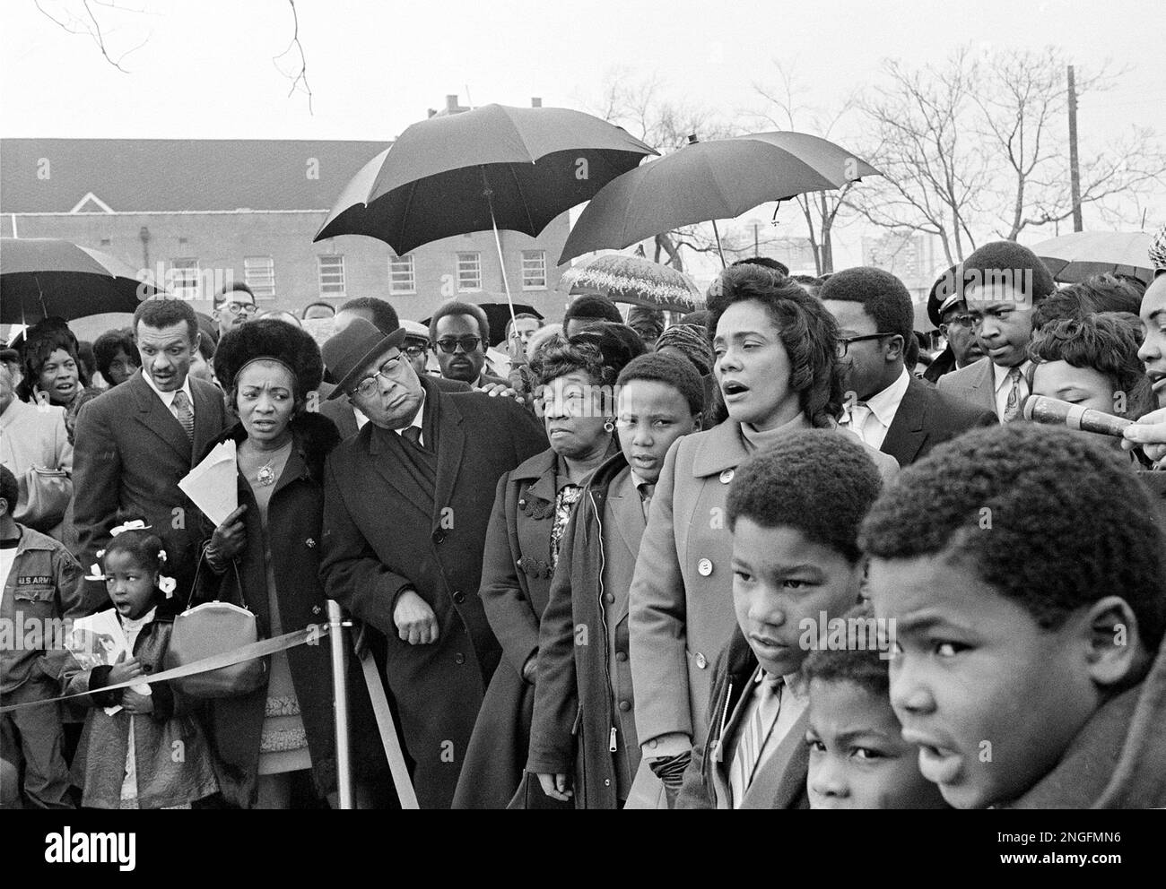 Mrs. Coretta King, center, stands with members of her family as she ...