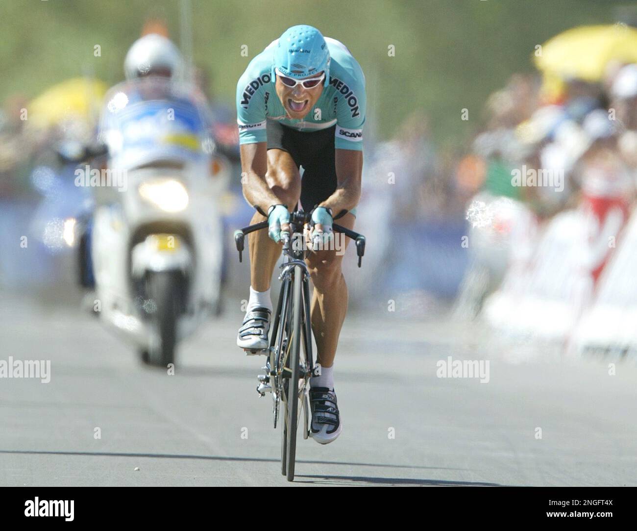 Jan Ullrich of Germany, of Team Bianchi, strains in the last meters of the 12th stage of the ...