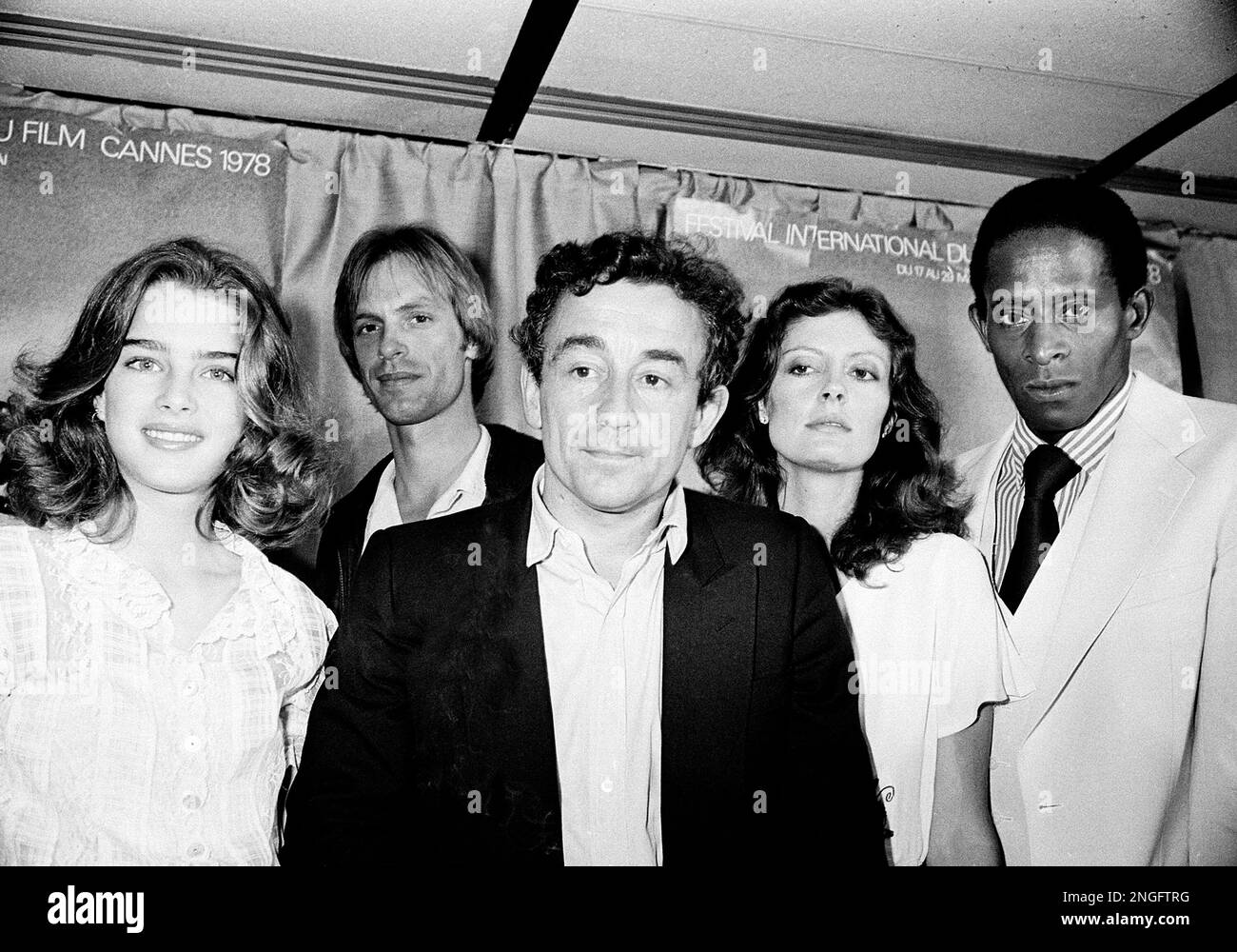 French director Louis Malle, center, is joined by actresses Brooke ...