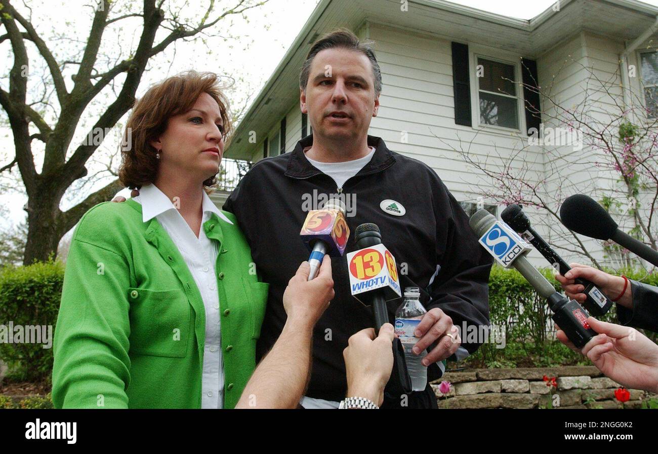 Larry Eustachy stands with his wife, Stacy, as he speaks to reporters ...