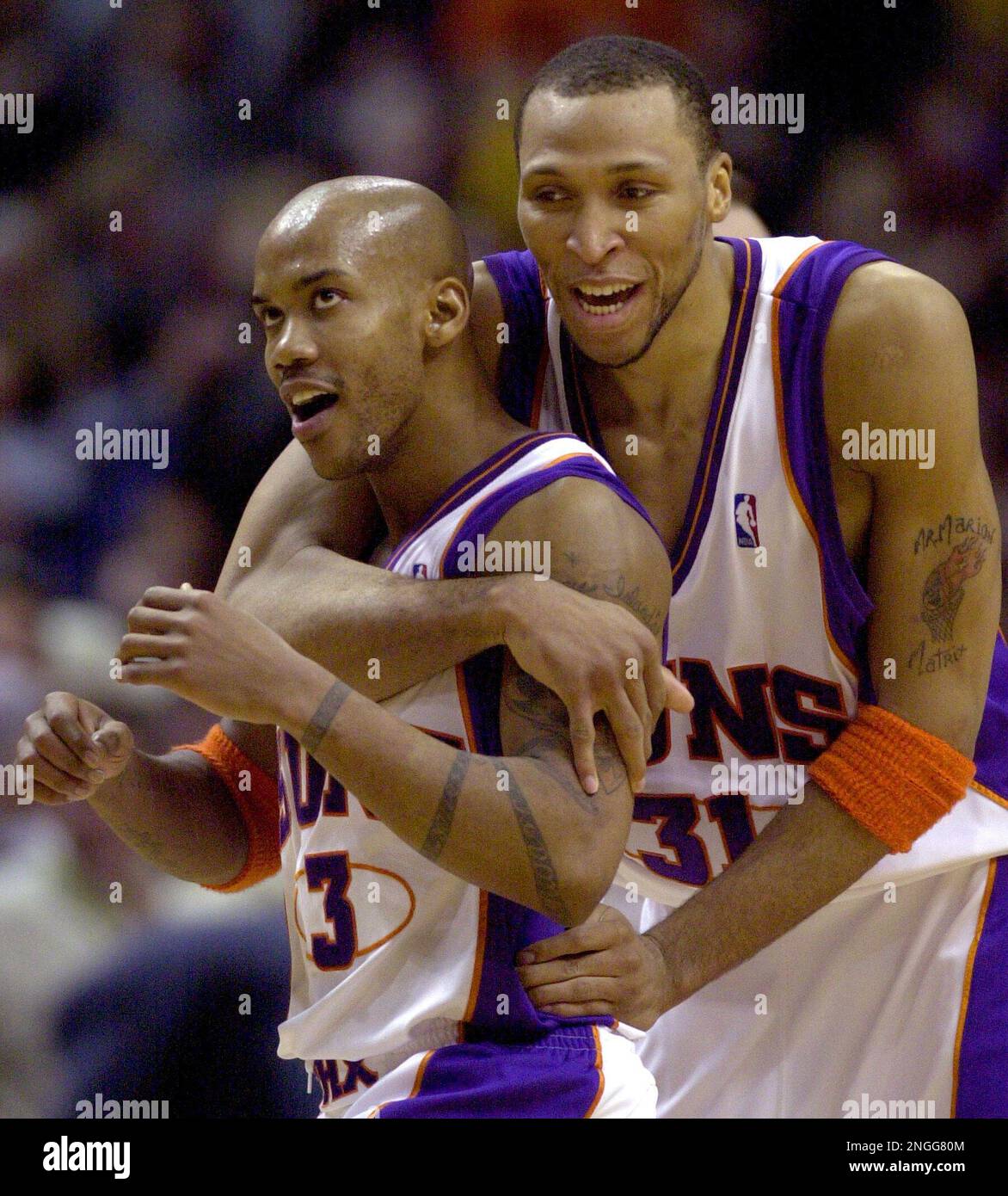 Phoenix Suns guard Stephon Marbury, left, is congratulated by teammate ...