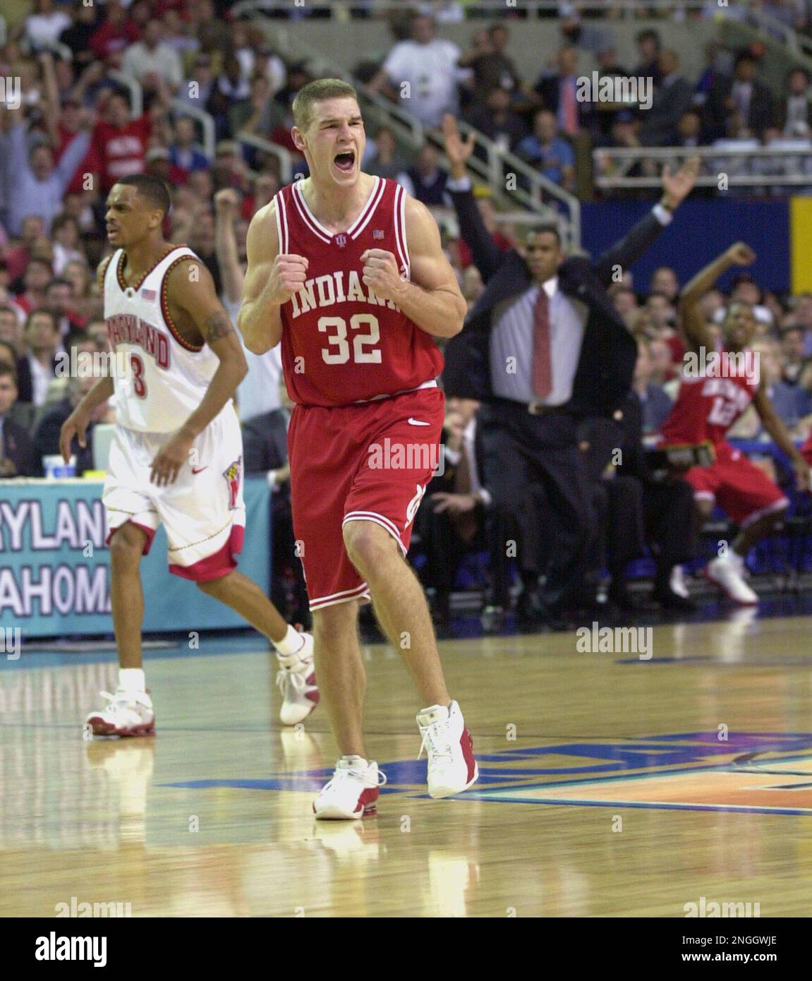 Indiana's Kyle Hornsby (32) celebrates as Indiana coach Mike Davis and ...