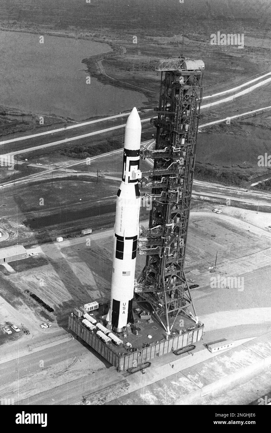 This aerial view shows the Saturn V space rocket, topped by Skylab I ...