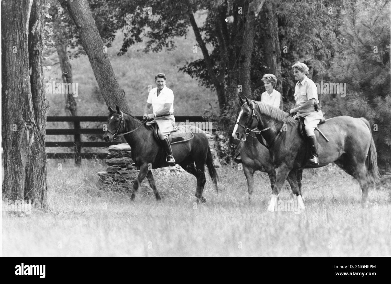 Presidential candidate Ronald Reagan, left, and Nancy Reagan are joined ...