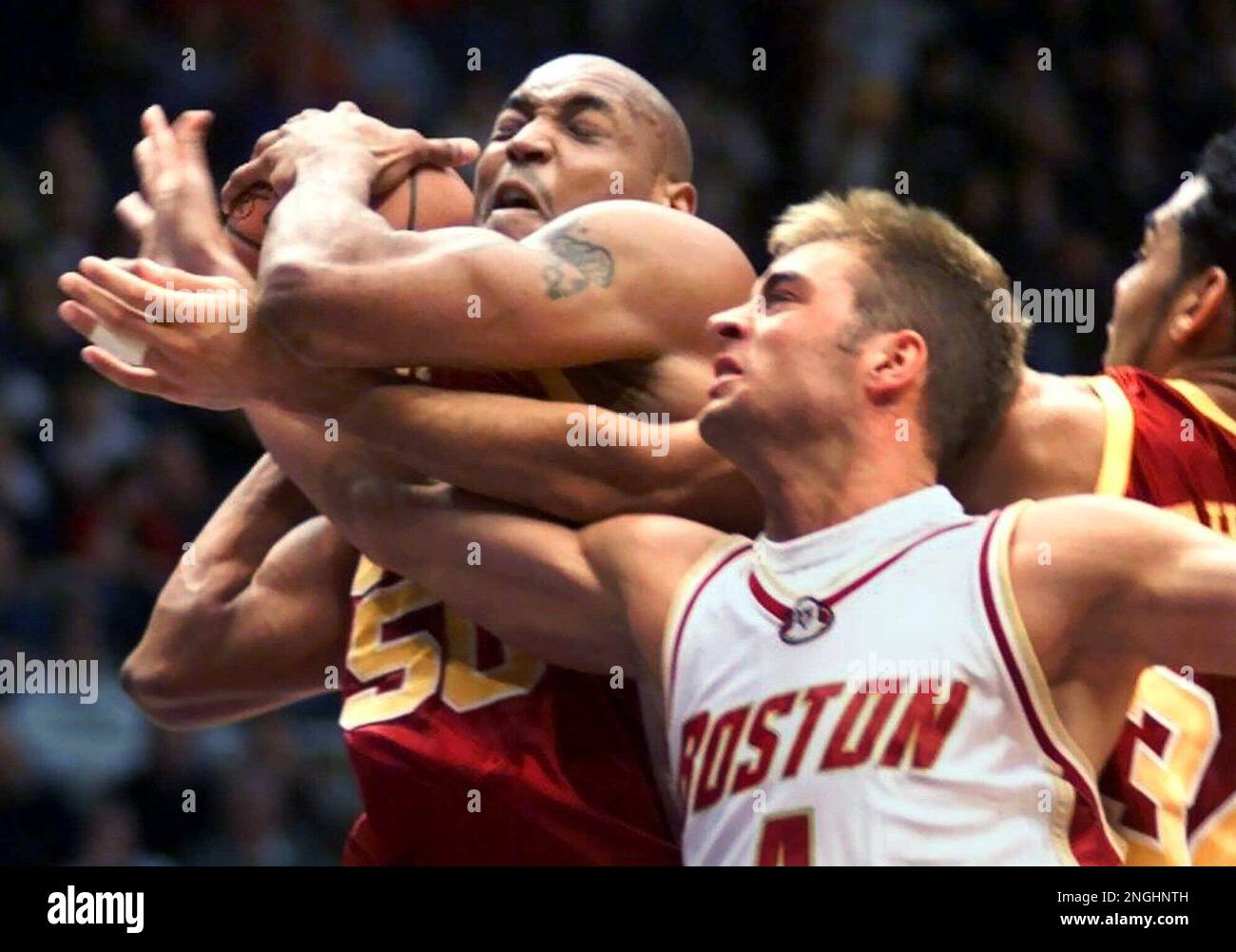 Southern California's Sam Clancy (50) and David Bluthenthal (34) fight ...