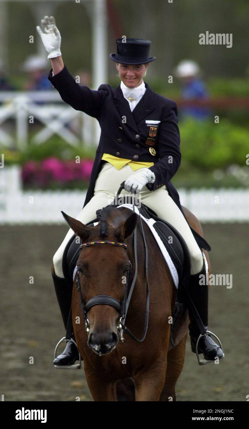 Germany's Alexandra Simons de Ridder, riding her horse Chacomo, waves ...