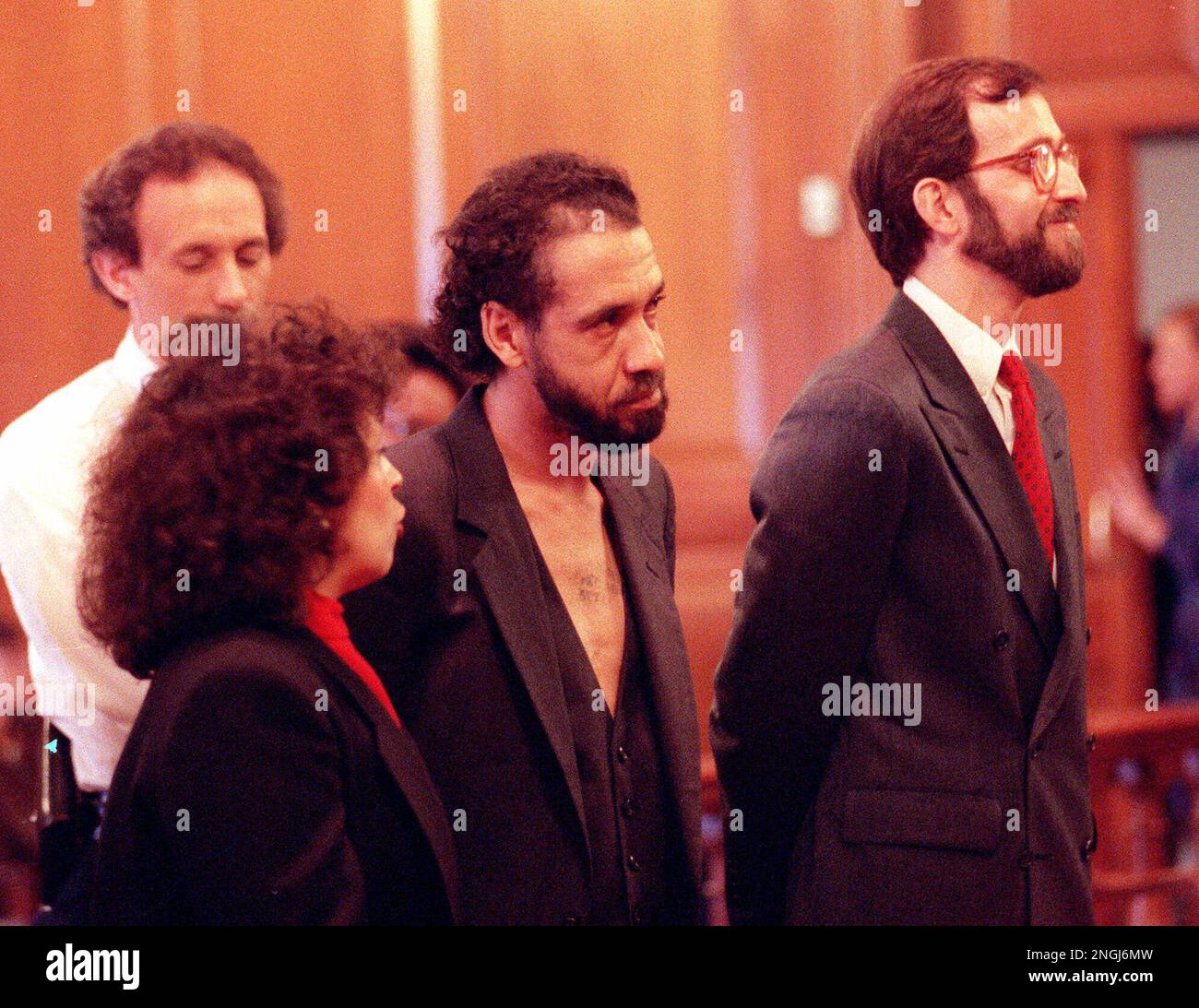 Julio Gonzalez, center, is arraigned in New York State Supreme Court ...