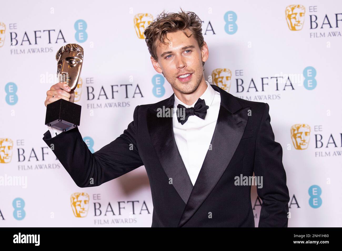Austin Butler, winner of the leading actor award for 'Elvis', poses for ...