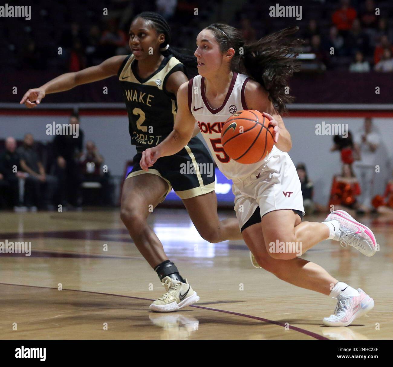 Virginia Tech's Georgia Amoore (5) drives past Wake Forest's Kaia ...