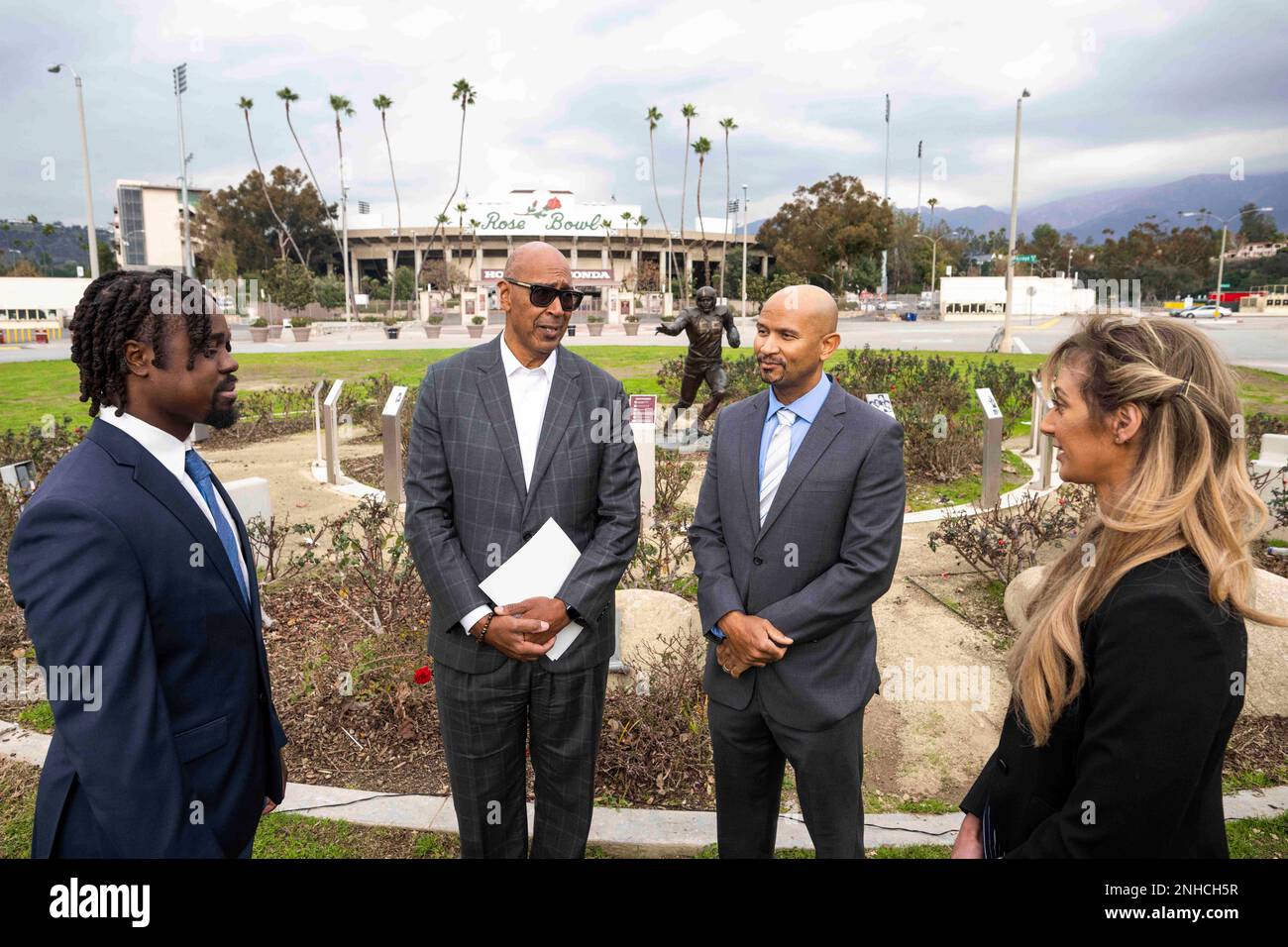 Assemblyman Chris Holden, second from left, stands during a news conference with football player ...