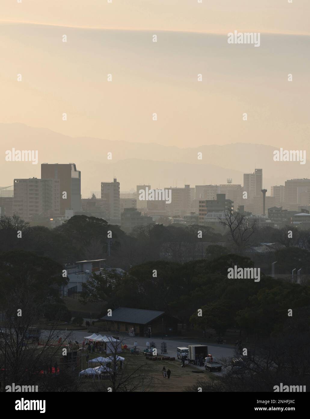 A photo shows yellow sand and air pollution covering the city of ...