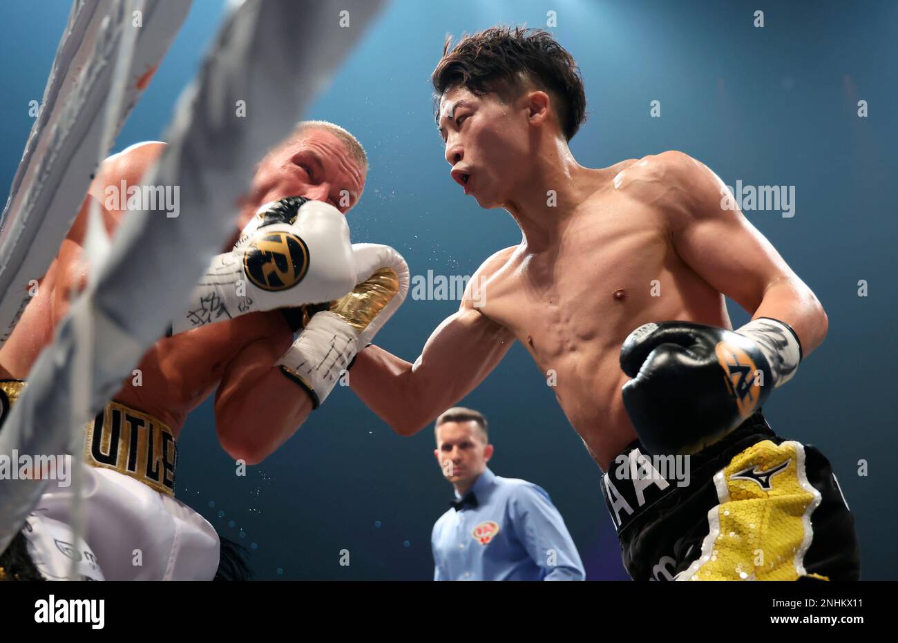 Naoya Inoue, Japanese three-division bantamweight champion, and British Paul Butler compete ...