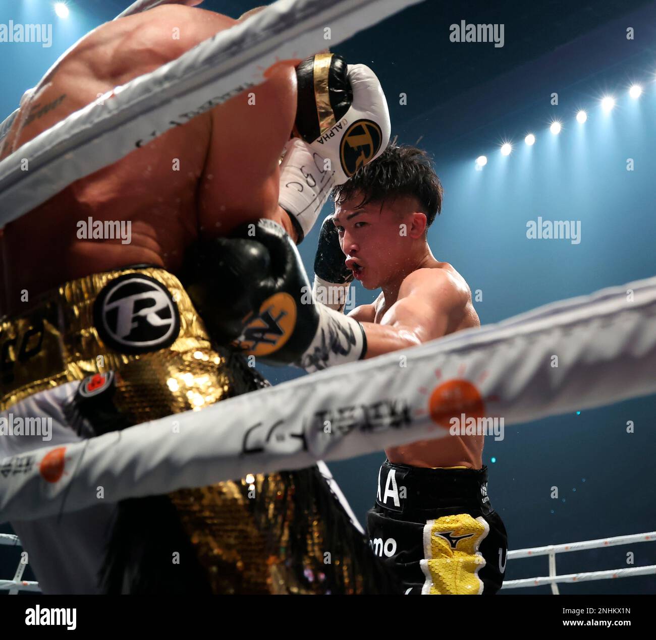 Naoya Inoue, Japanese three-division bantamweight champion, and British Paul Butler compete ...