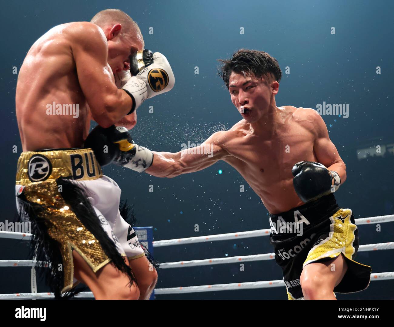 Naoya Inoue, Japanese three-division bantamweight champion, and British Paul Butler compete ...
