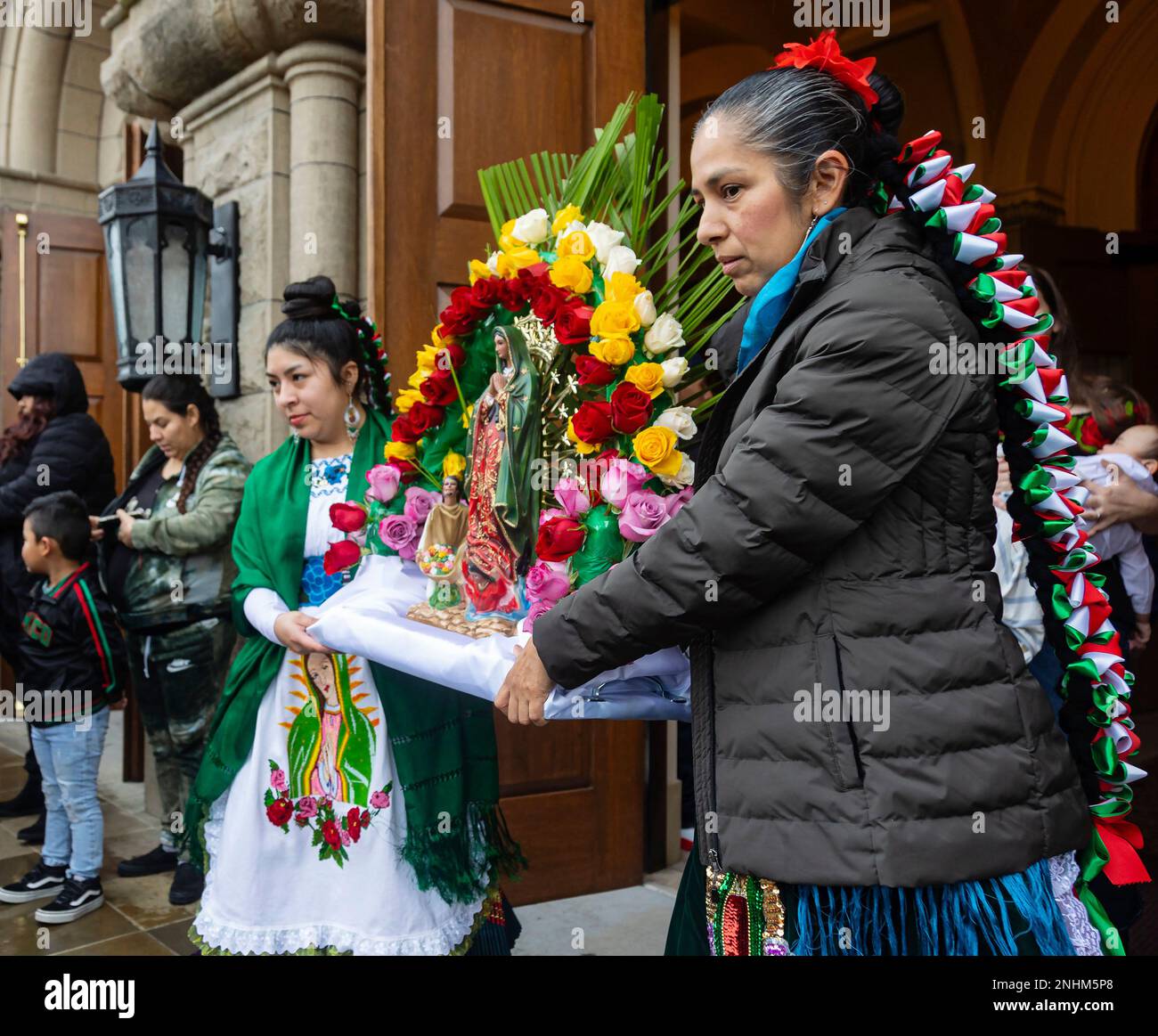 Catholic faithful carry a statue of Our Lady of Guadalupe from the ...