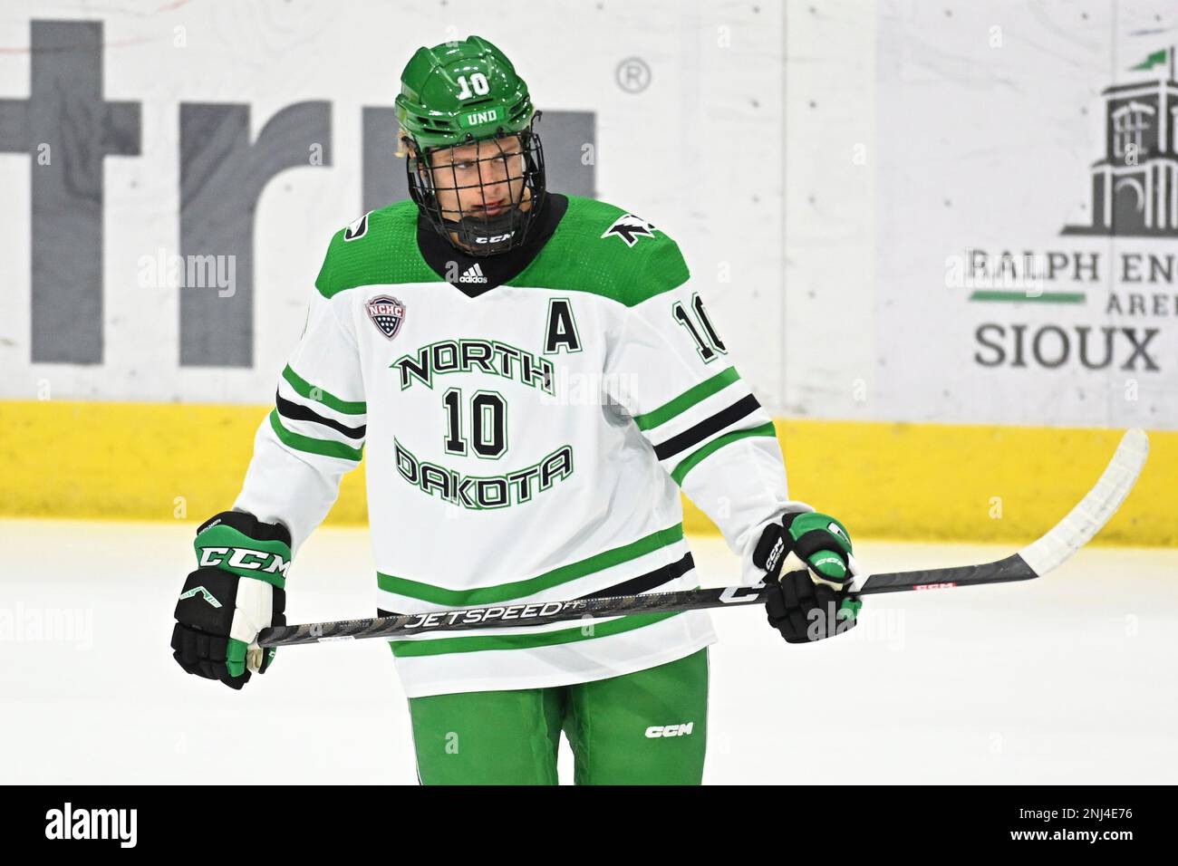North Dakota Fighting Hawks forward Gavin Hain (10) warms up prior to a NCAA men's hockey game ...