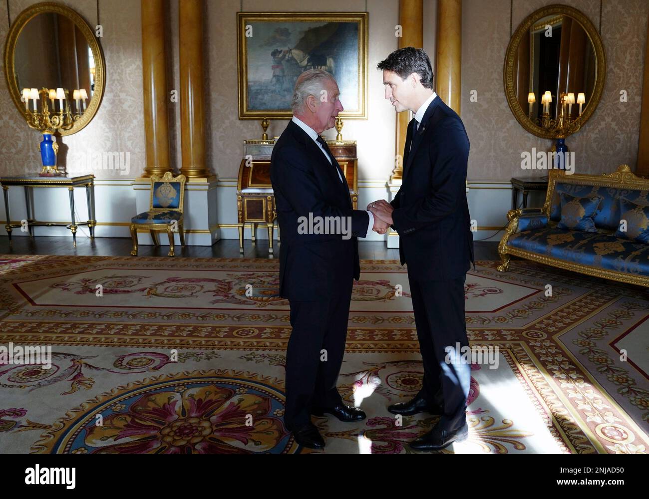 Britain's King Charles III shakes hands with Prime Minister of Canada ...
