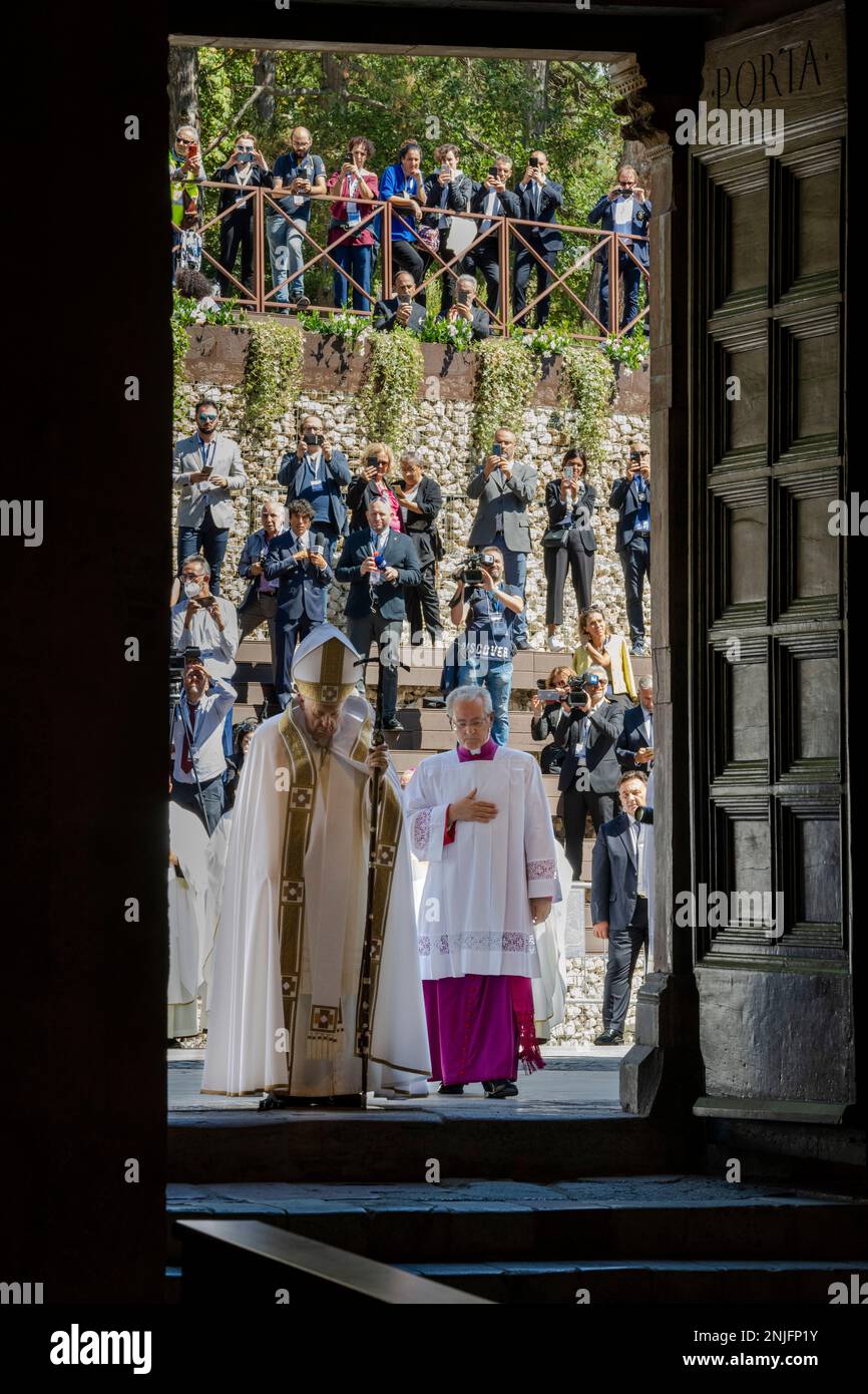 Pope Francis, flanked by Mons. Diego Ravelli, right, opens the Holy ...