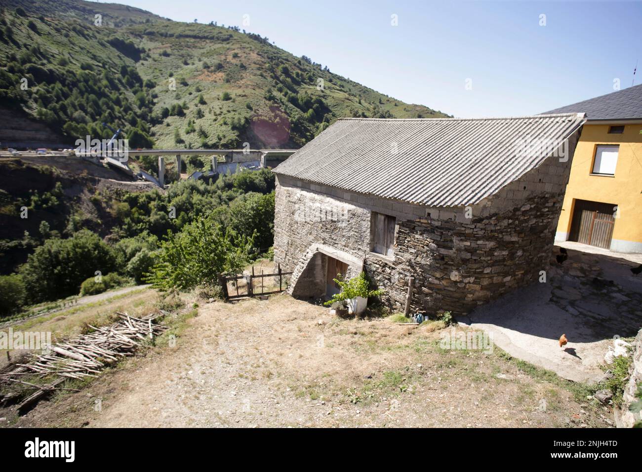 Operators and cranes work during the dismantling of the third and last ...