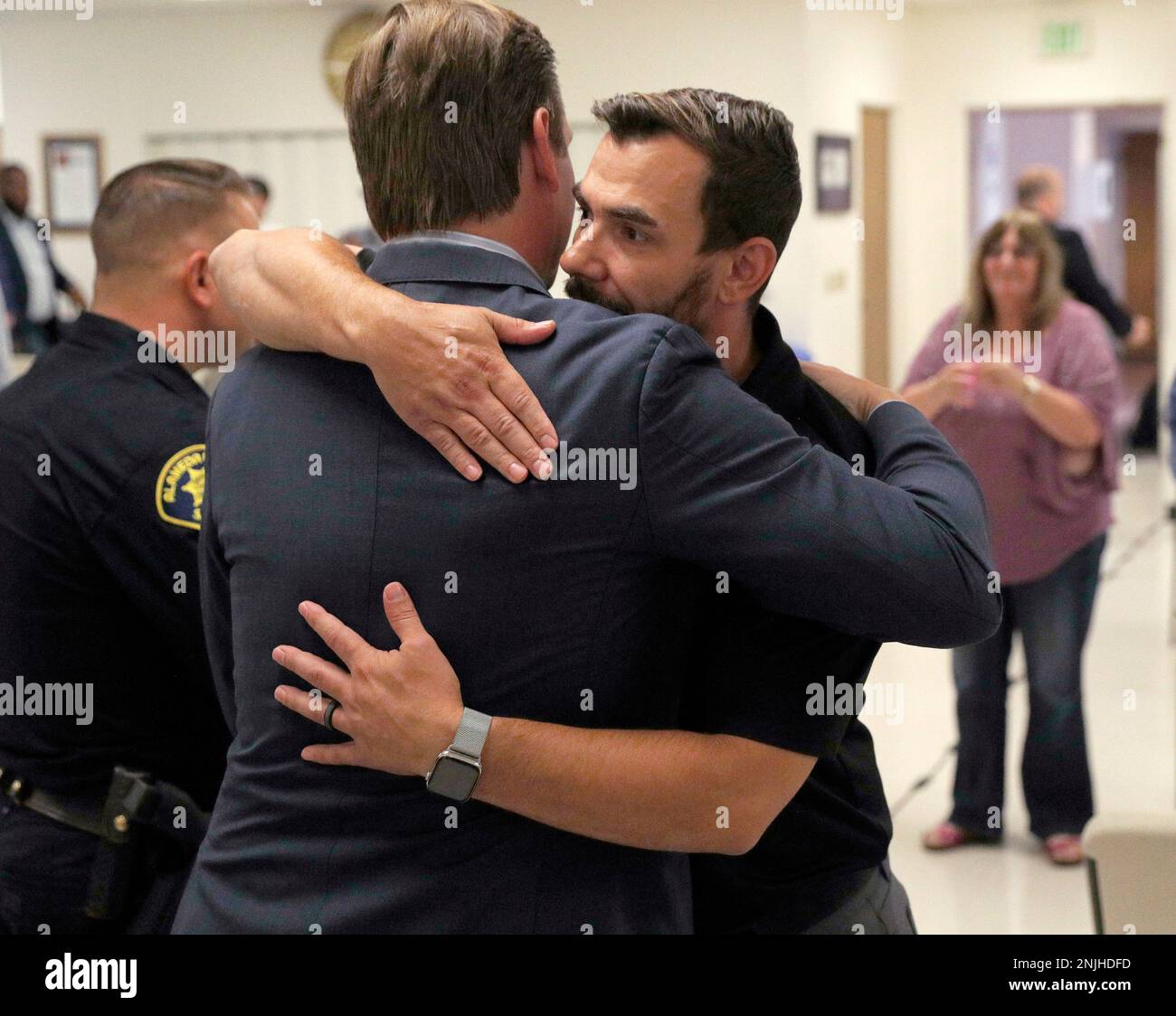 California Rep. Eric Swalwell gets a hug from his brother Josh Swalwell ...