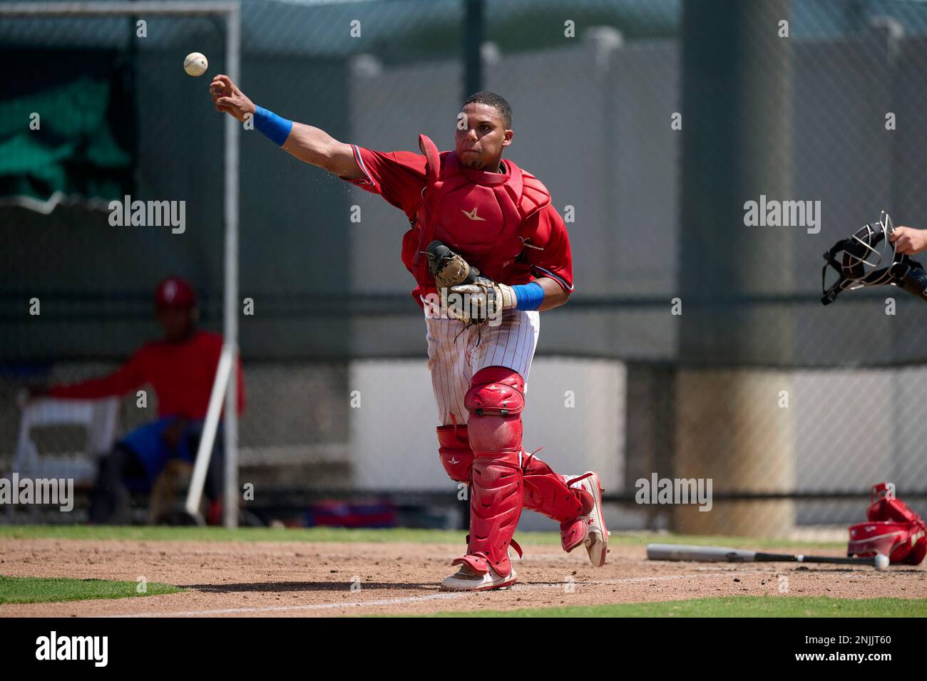 FCL Phillies catcher Adony Mejia (86) throws to third base during a ...