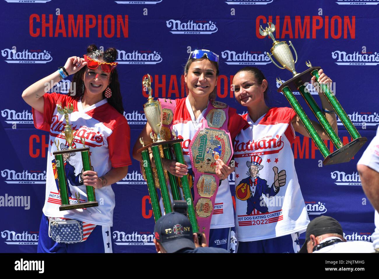 Photo by: NDZ/STAR MAX/IPx 2022 7/4/22 Top three women's finishers Sarah Rodriguez, Miki Sudo ...