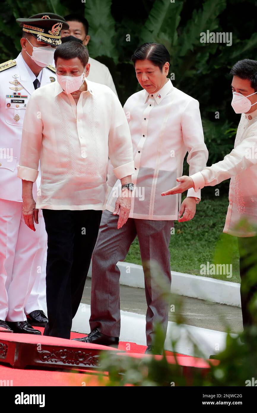 Incoming Philippine president Ferdinand Marcos Jr., second right, and ...