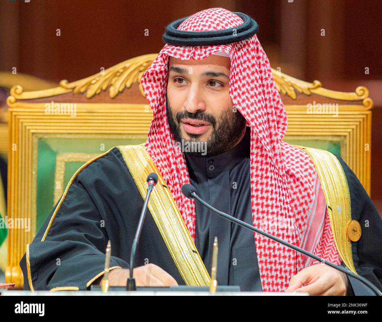 In this photo released by Saudi Royal Palace, Saudi Crown Prince ...
