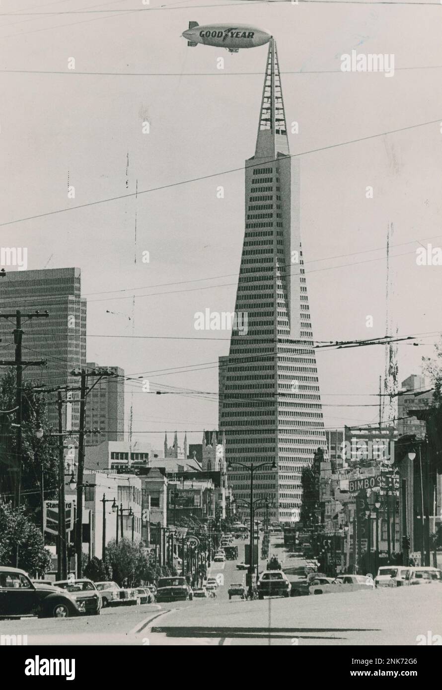 The Goodyear Blimp appears to be kissing the tip of the Transamerica ...