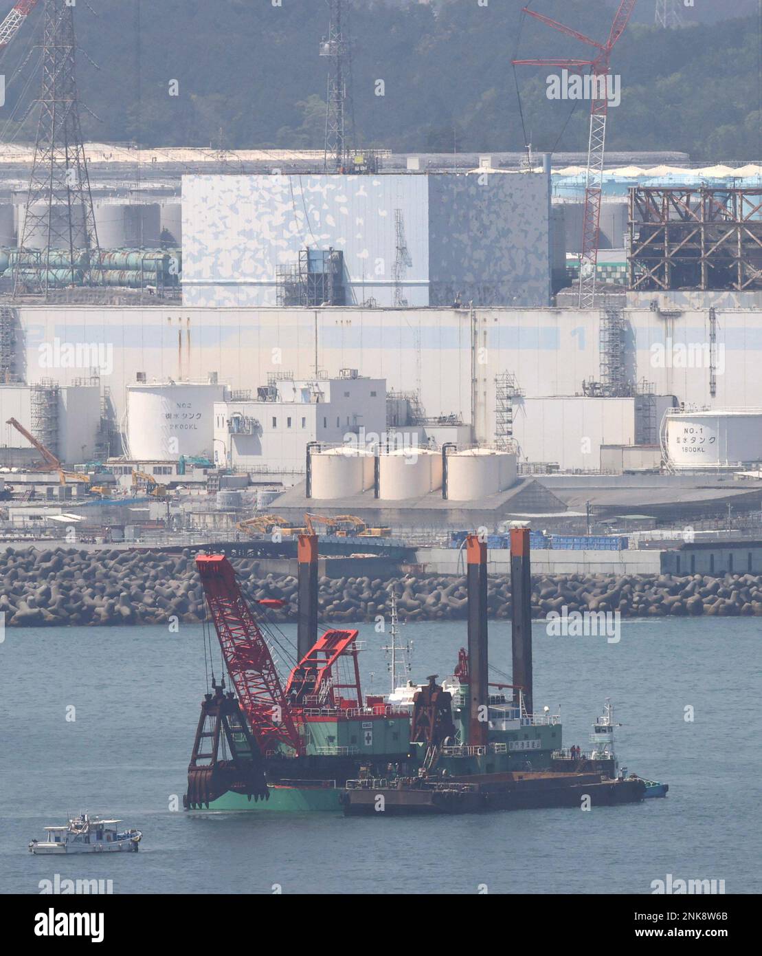An aerial photo shows a drilling vessel off the crippled Fukushima No ...