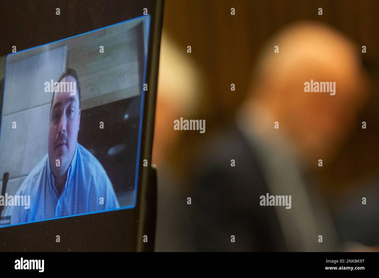 Pittsburgh Steelers' Henry Mondeaux appears on a courtroom monitor ...