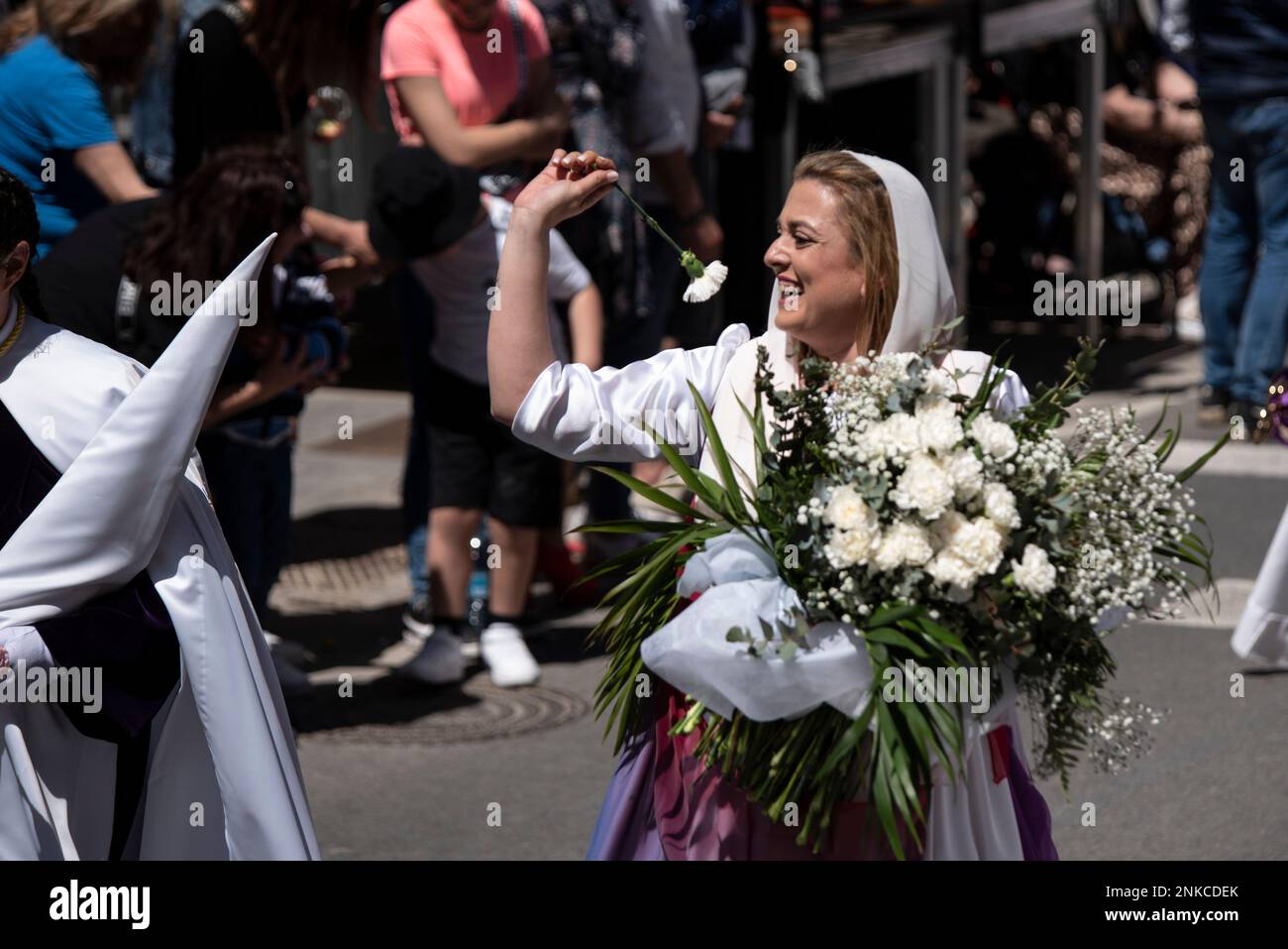 Several people take part in the Easter Sunday parade of the Semana ...