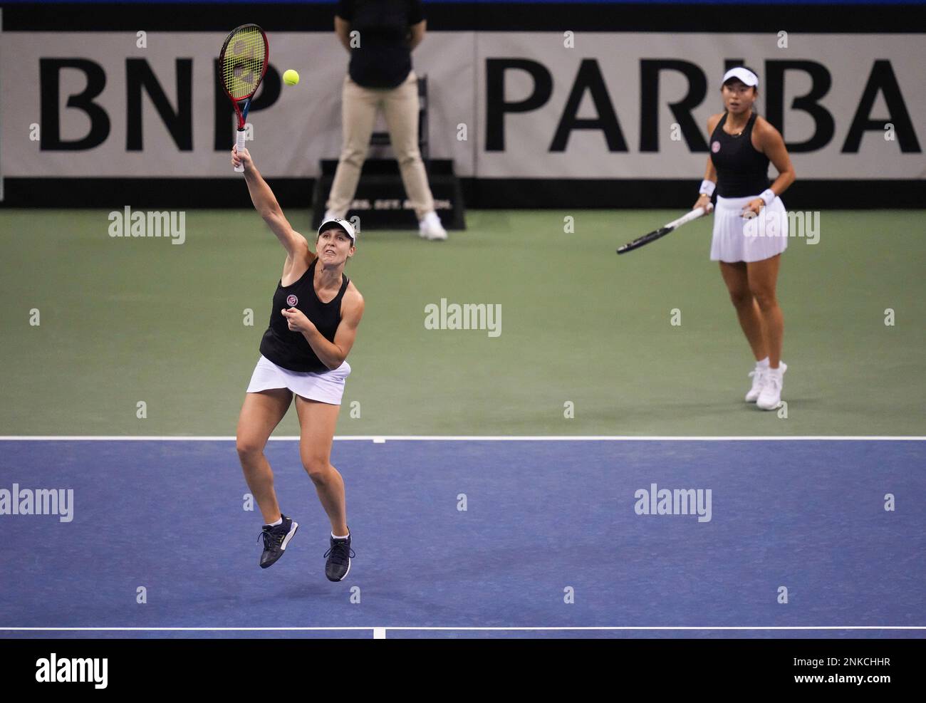 Canada's Gabriela Dabrowski, left, returns as she and Carol Zhao played ...