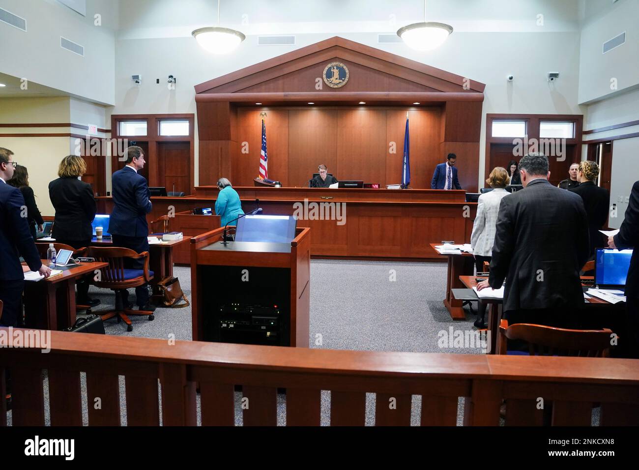 Judge Penney Azcarate presides as actress Amber Heard, front right and ...