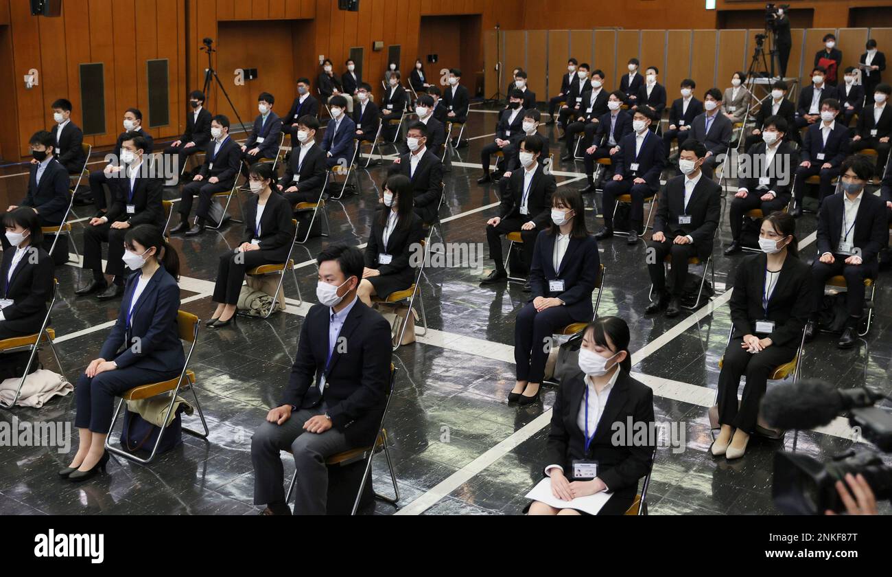 New employees of Panasonic Group attend an entrance ceremony in Kadoma ...