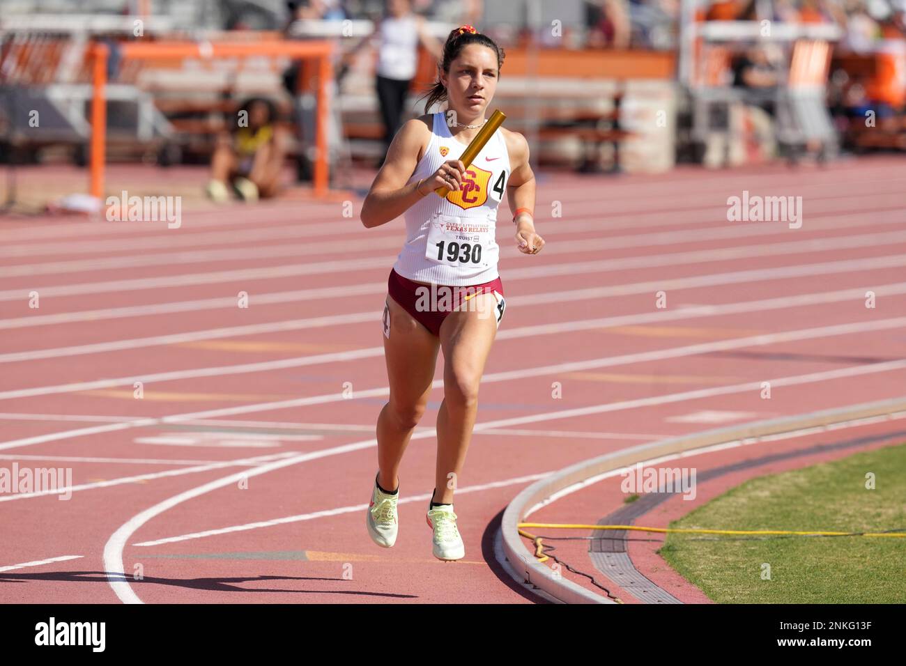 Gigi Maccagnini runs the second leg on the Southern California Trojans ...