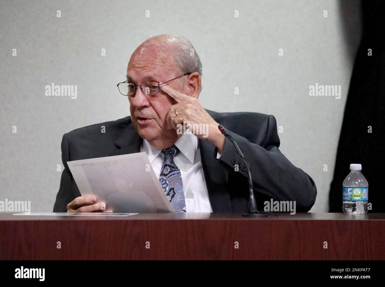 Former Tampa police captain Curtis Reeves points to his left eye while ...