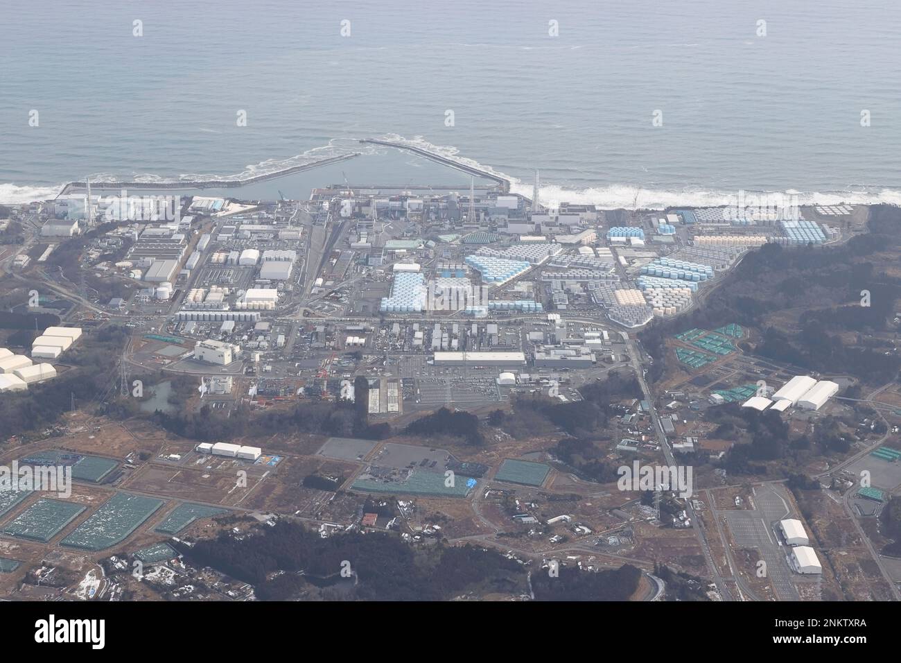 An aerial photo shows the Fukushima No. 1 Nuclear Power Plant operated ...