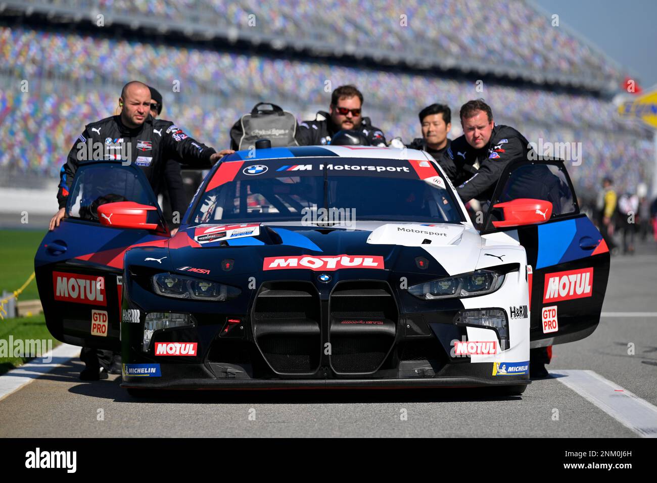 DAYTONA, FL - JANUARY 23: The crew of the #24 BMW M Team RLL BMW M4 GT3 ...