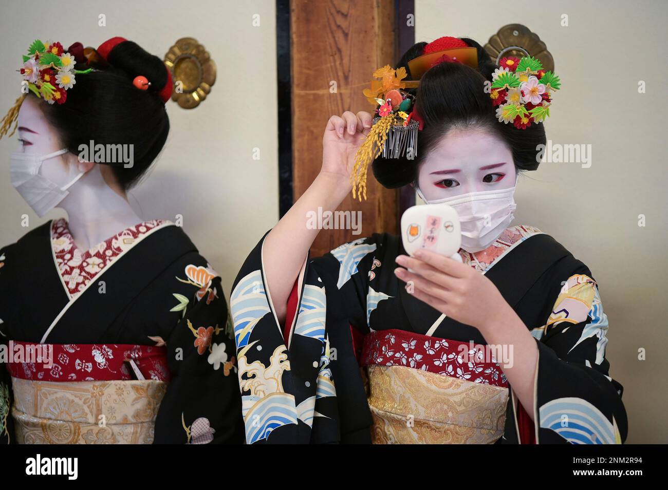 Maiko of Gion Kobu, one of Kyoto's five Kagai, a district where geiko and maiko live and work ...