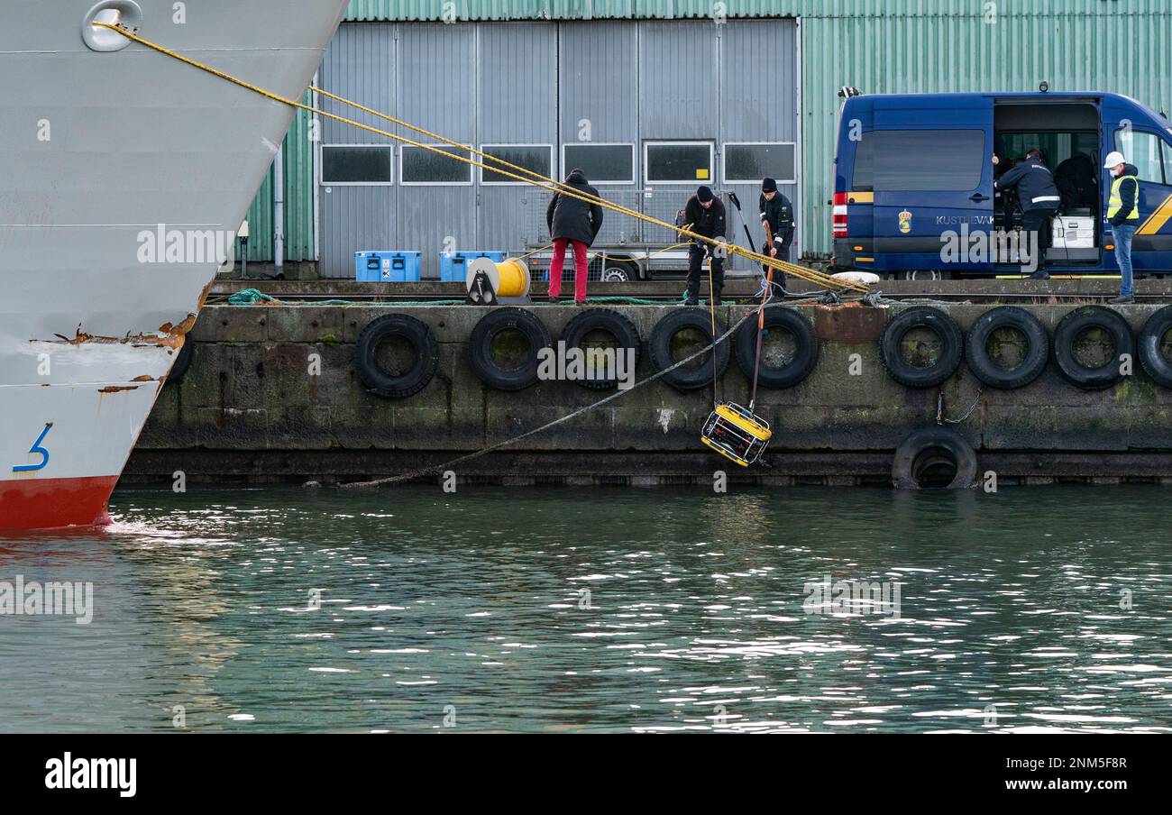 Personnel from the Swedish Coast Guard use an underwater drone (ROV) to ...